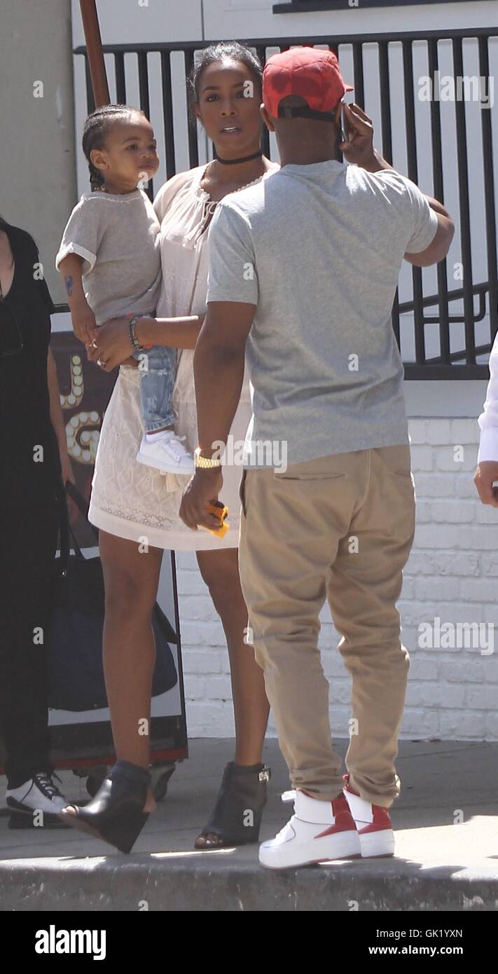 Kelly Rowland with her husband Tim Witherspoon and their son Titan ...