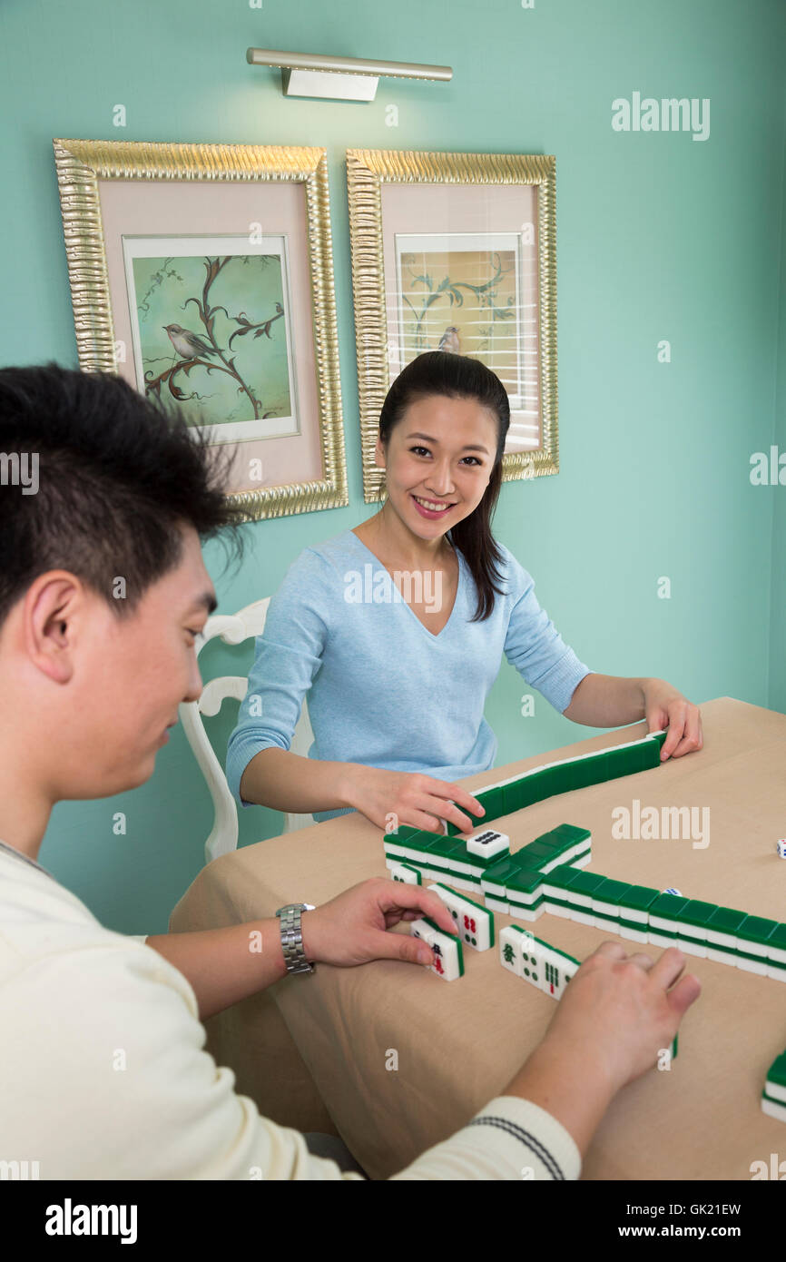 A people playing mahjong Stock Photo - Alamy
