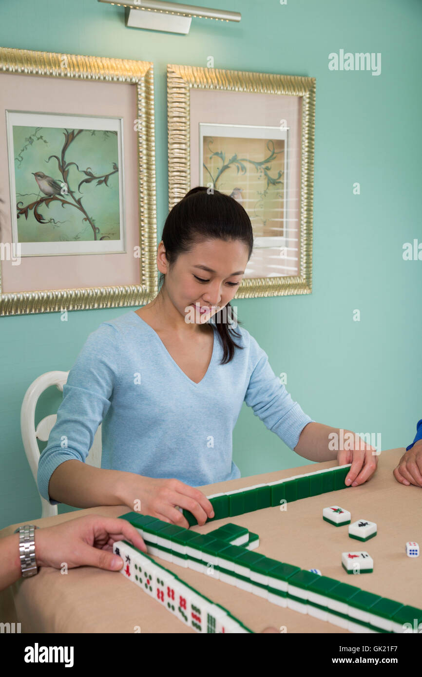 A people playing mahjong Stock Photo - Alamy