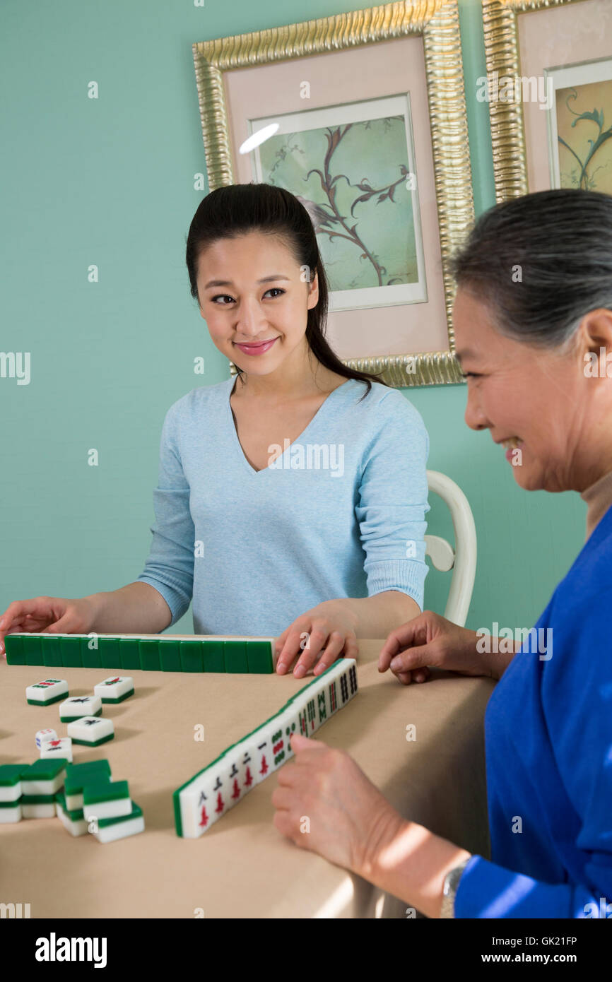 A people playing mahjong Stock Photo - Alamy