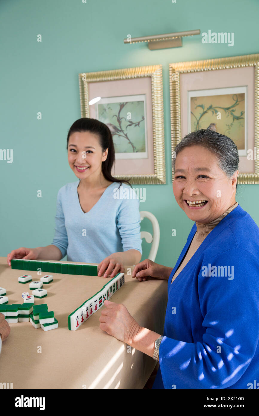 A people playing mahjong Stock Photo - Alamy