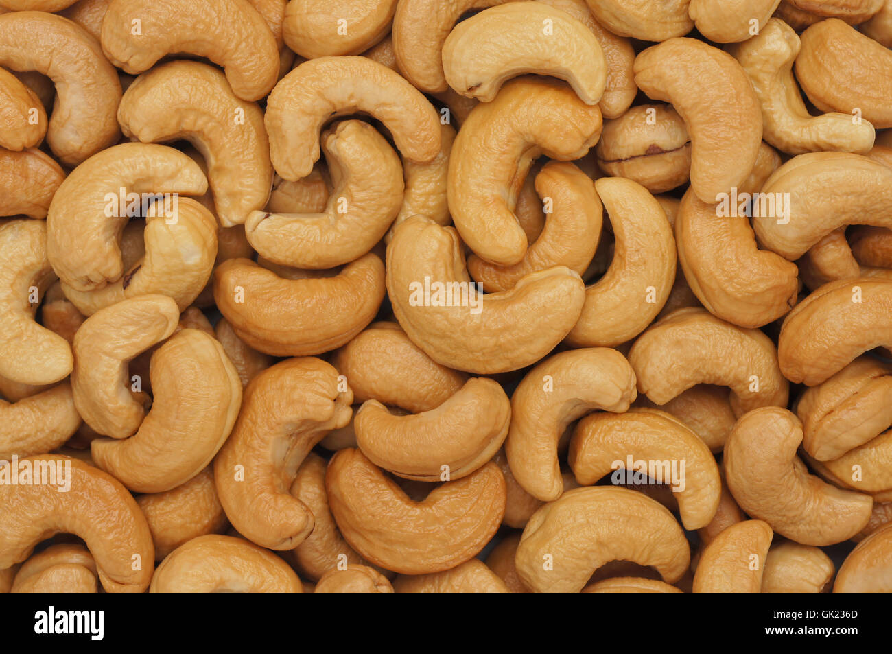Close-up and detail of cashew seeds background Stock Photo - Alamy