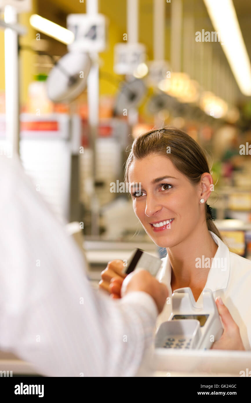 cashier in the supermarket Stock Photo - Alamy