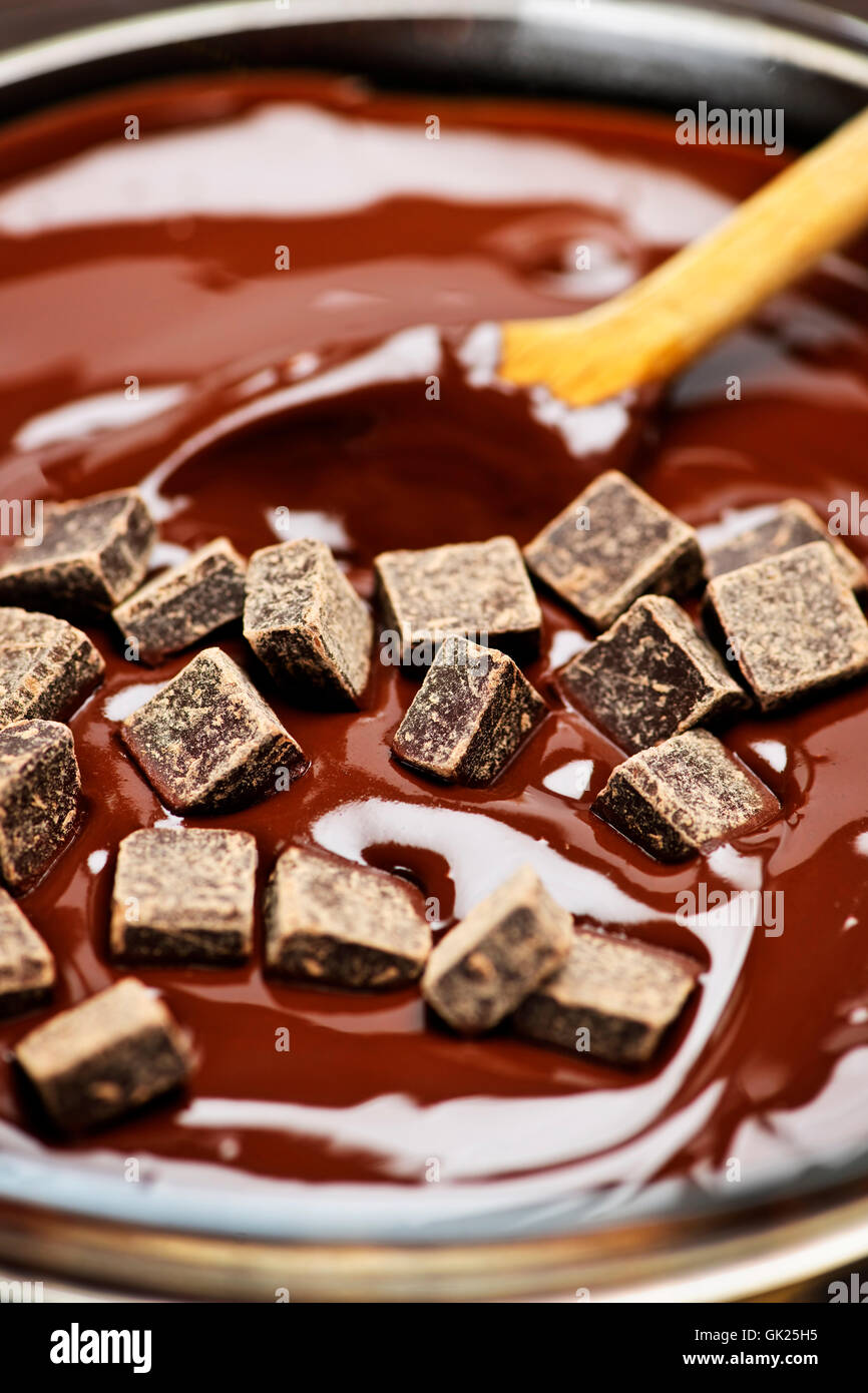 cocoa melting spoon Stock Photo - Alamy