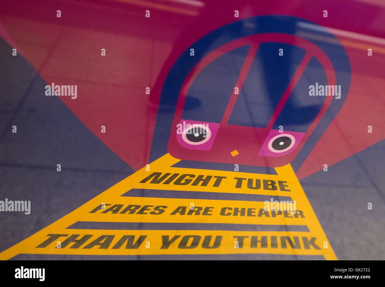 An advert for the night tube at an entrance to Oxford Circus ...