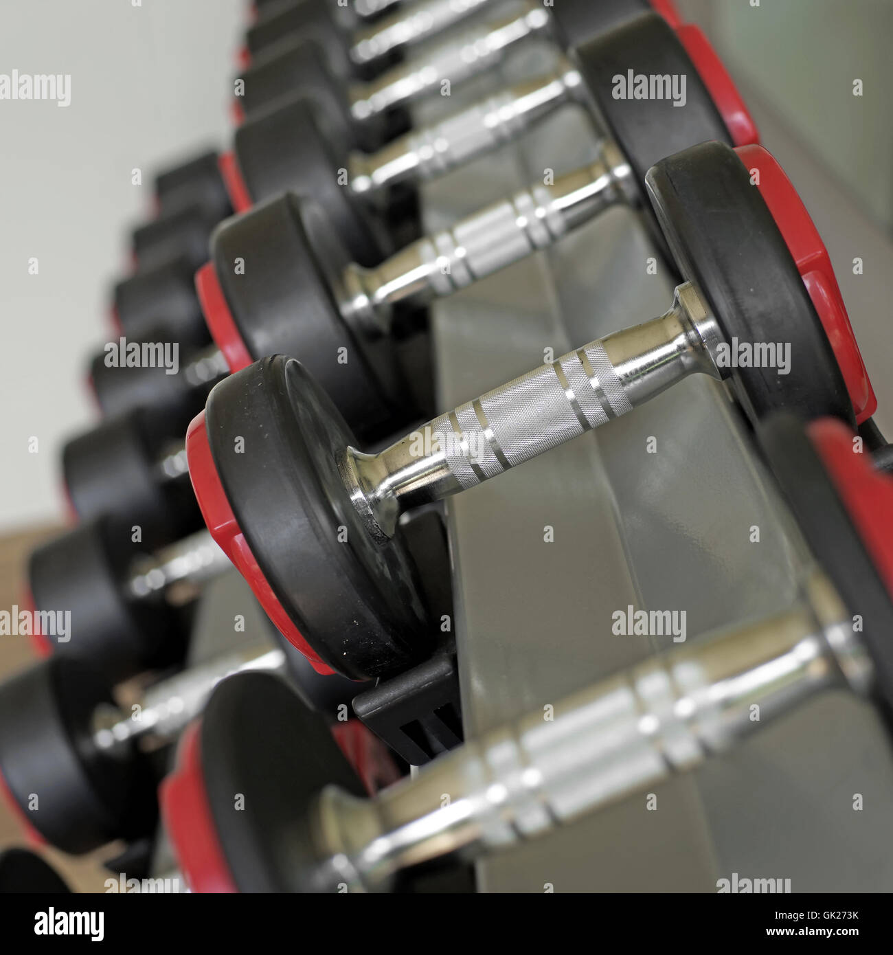 lifting weight, rows of sports dumbbells in the gym Stock Photo - Alamy