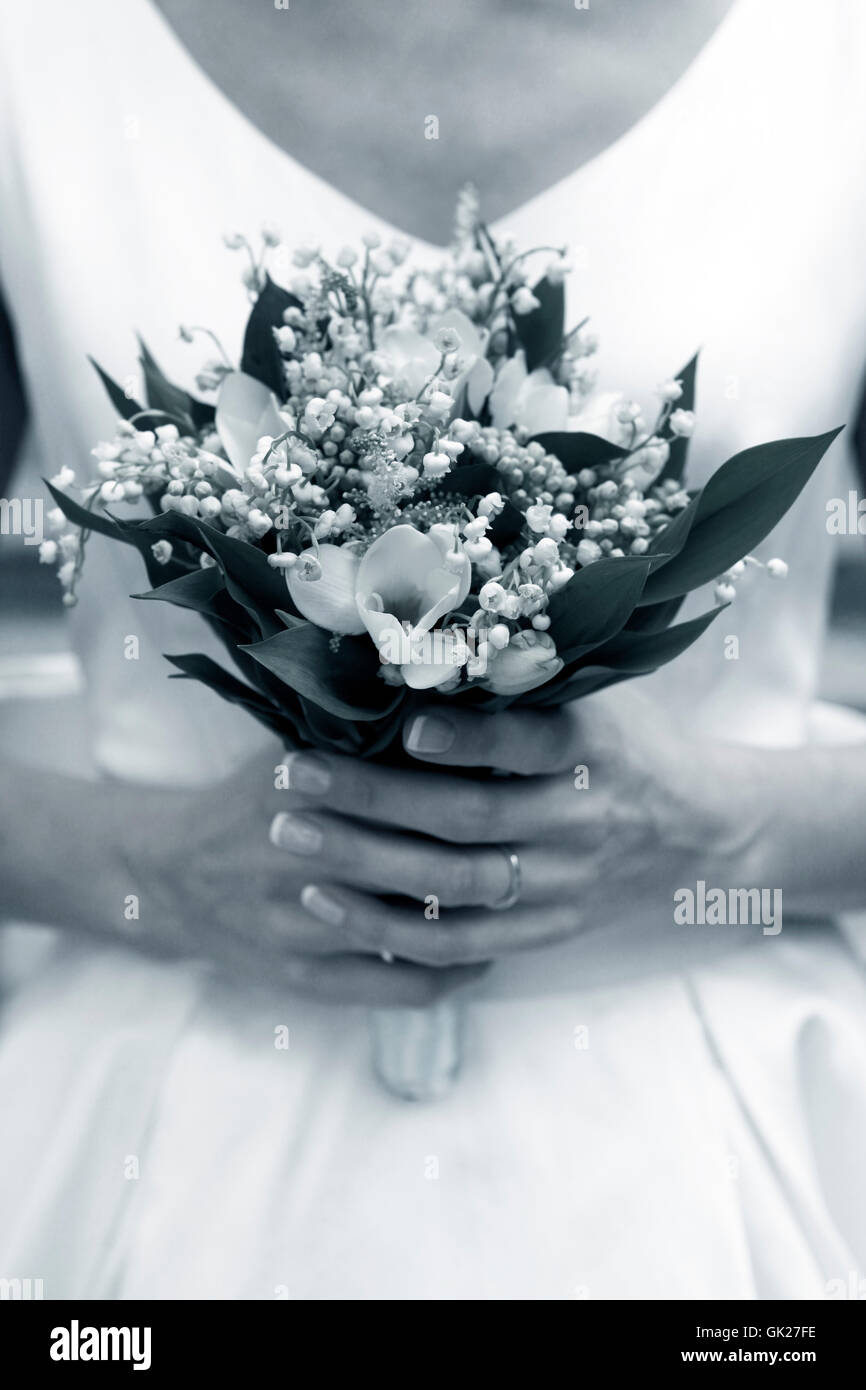 Woman holds small bouquet hi-res stock photography and images - Alamy