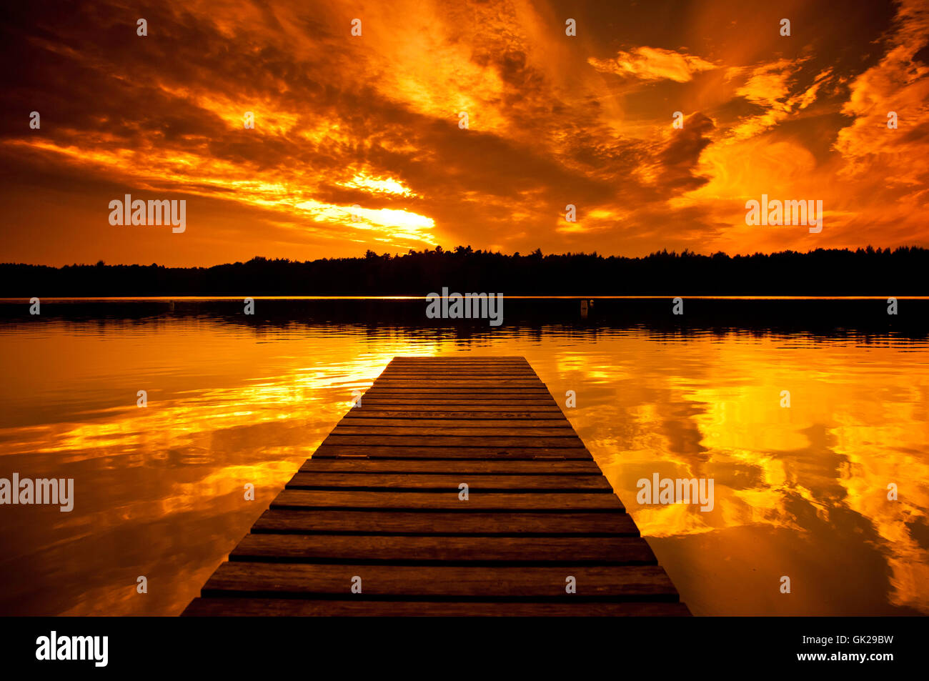 sunset by the lake Stock Photo - Alamy