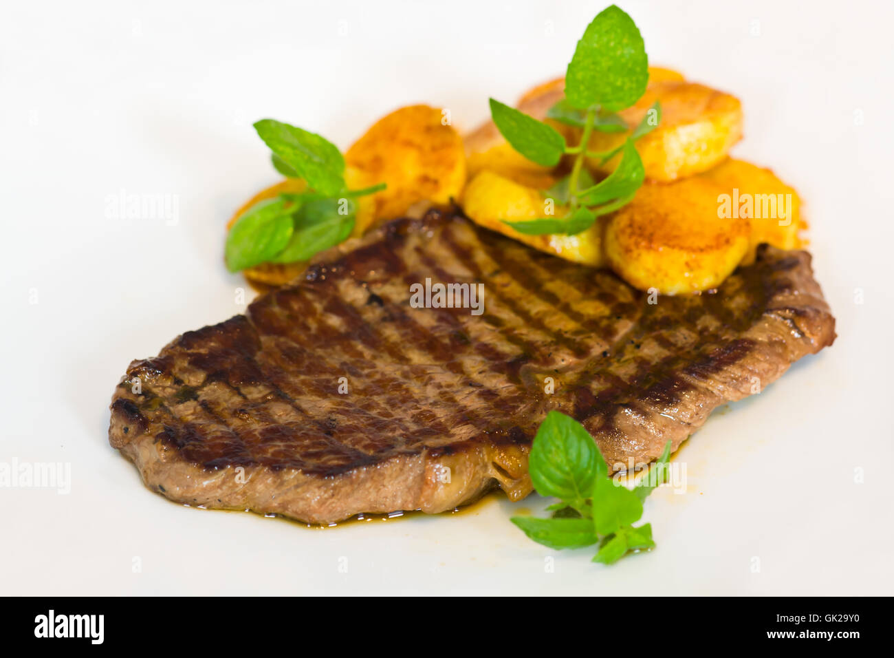 rump steak with fried potatoes Stock Photo - Alamy