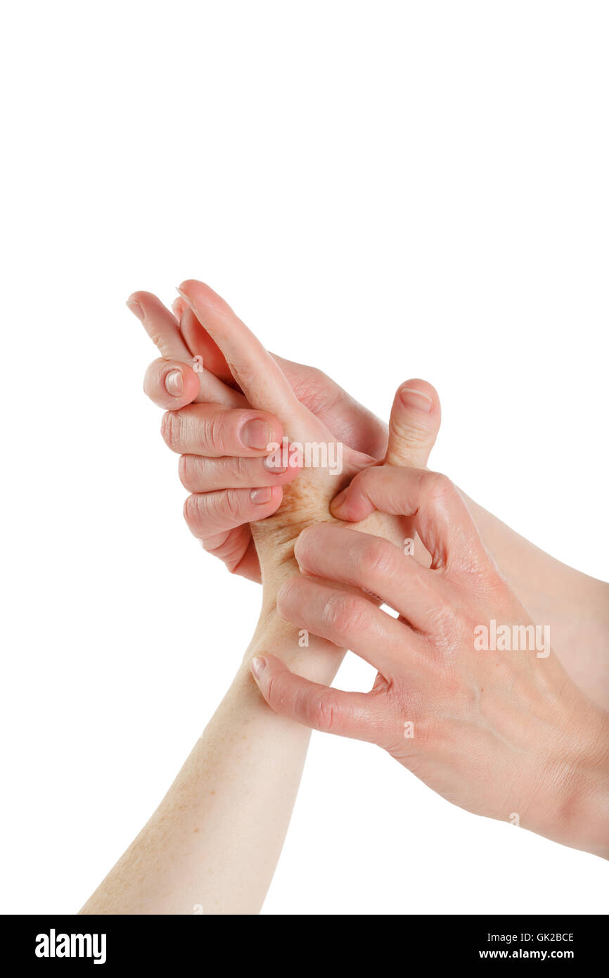 Massage therapist performing hand massage Stock Photo - Alamy