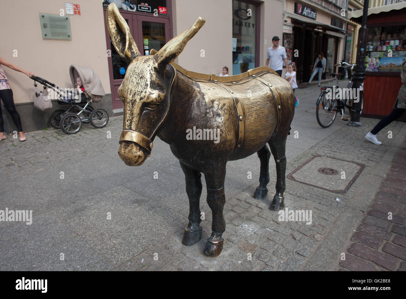 The Donkey statue on Old Town Square in city of Torun, Poland Stock ...