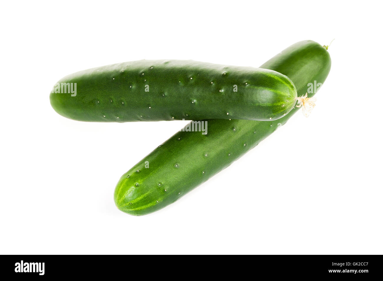 two cucumbers isolated on white background Stock Photo - Alamy