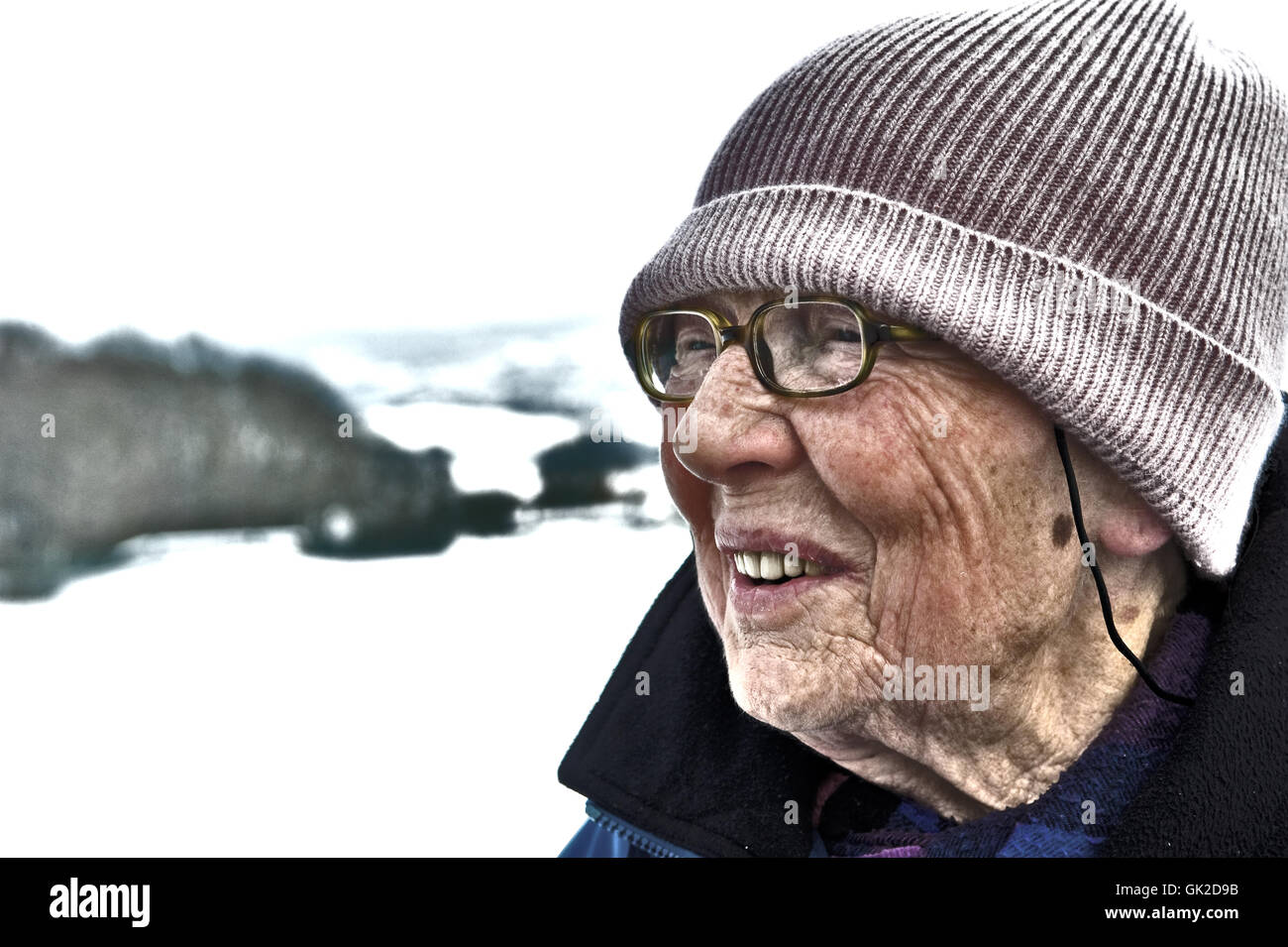 old woman in front of winter landscape Stock Photo - Alamy