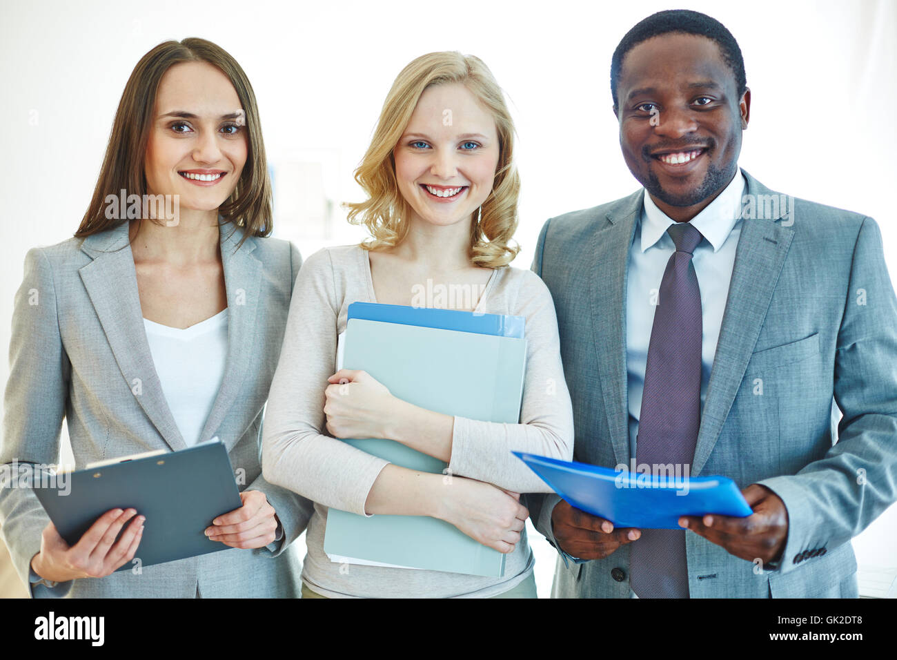 Team three successful business people hi-res stock photography and ...