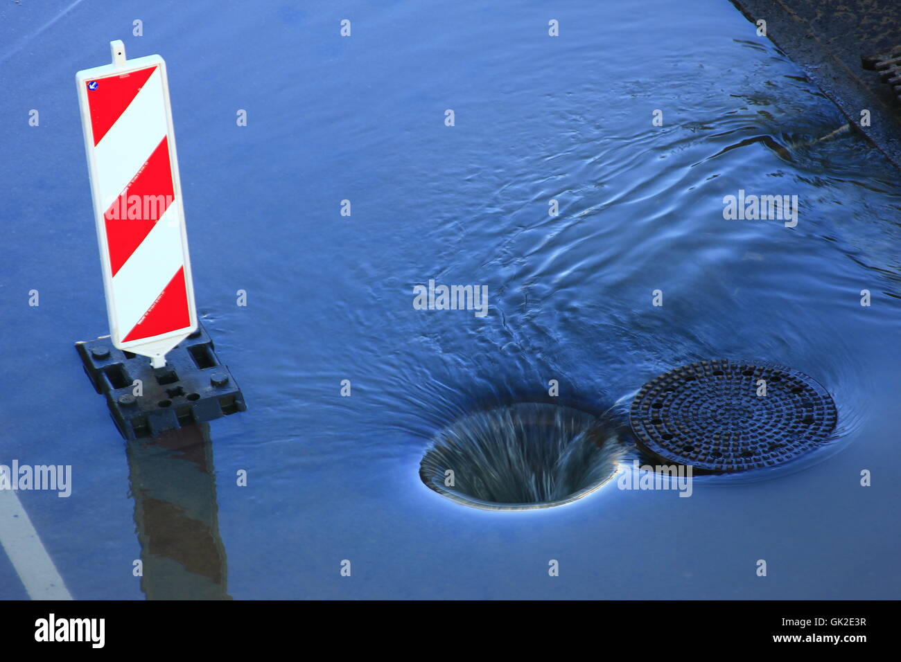 open manhole in a street Stock Photo - Alamy