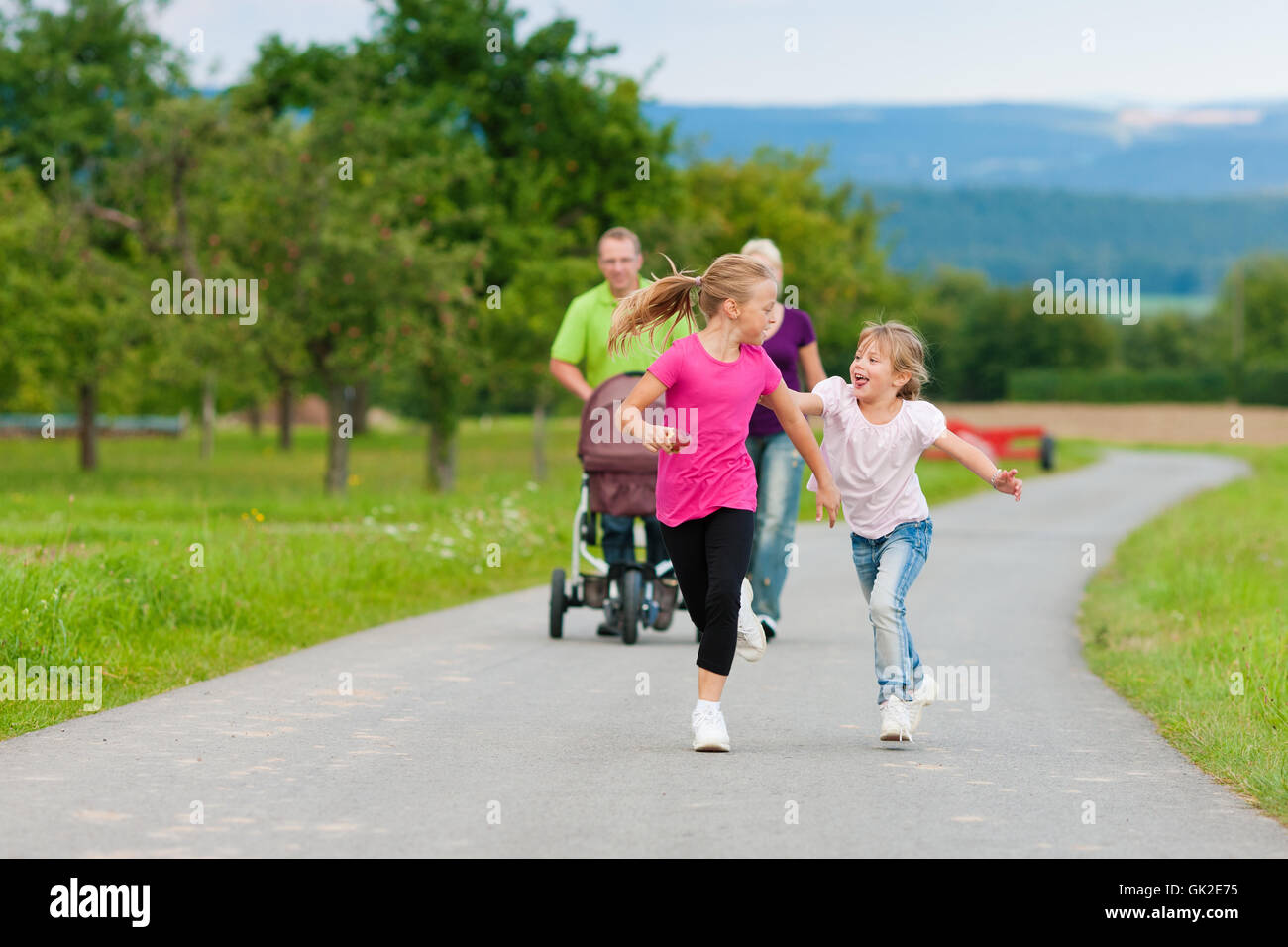 family with children on walk Stock Photo - Alamy