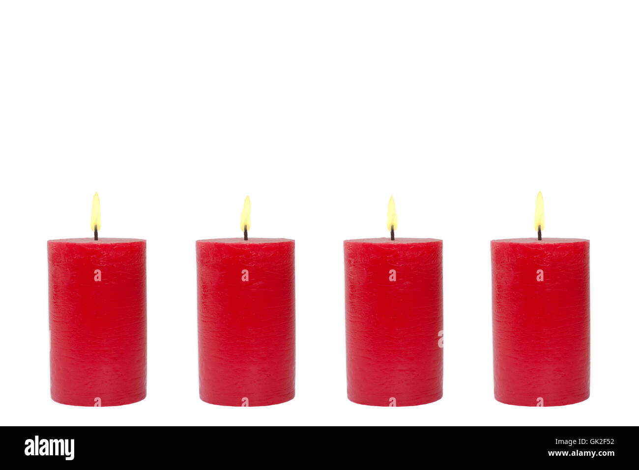 four red candles,white background Stock Photo - Alamy