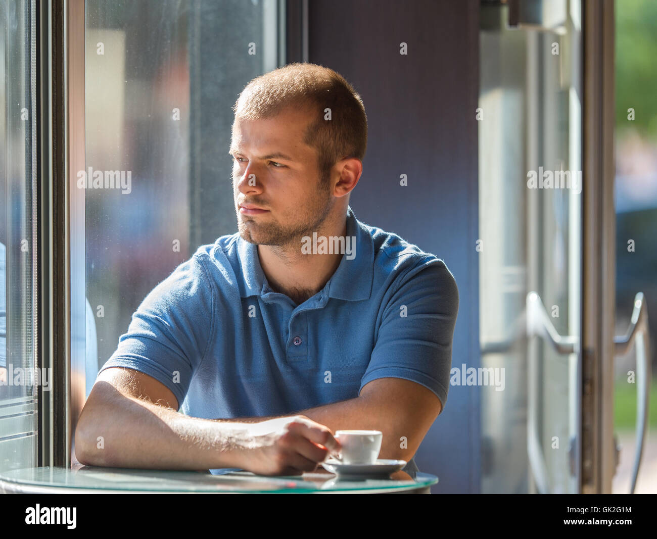 Man cafe thinking hi-res stock photography and images - Alamy