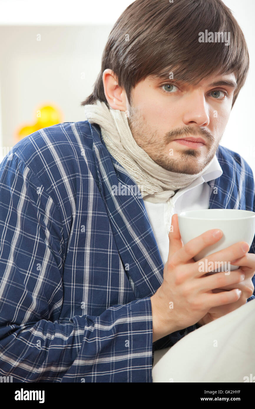 Sad depressed man drinking tea hi-res stock photography and images - Alamy