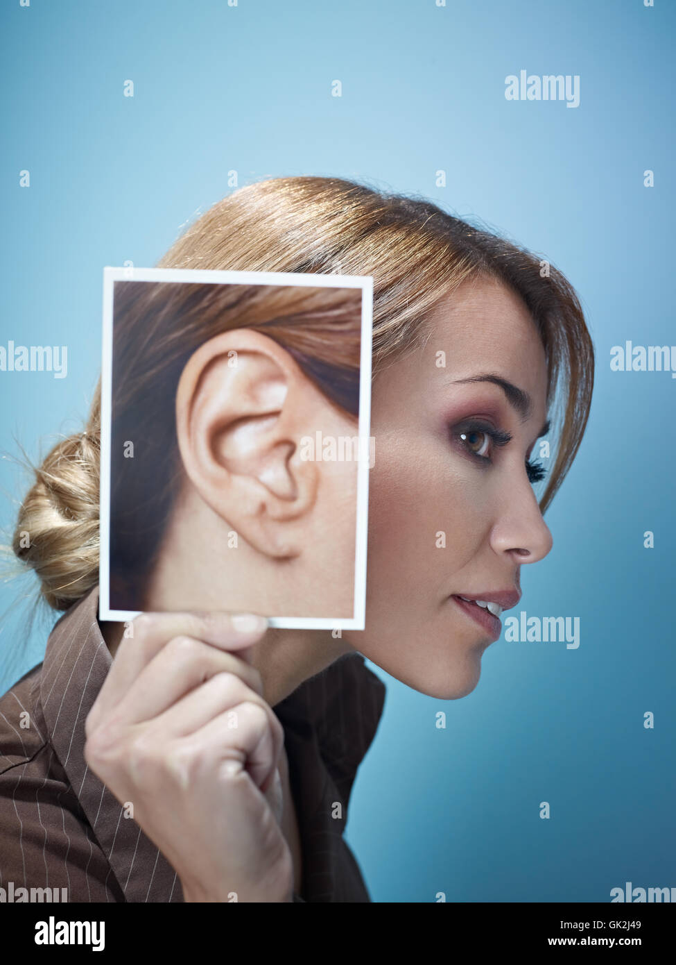Big human ear hi-res stock photography and images - Alamy