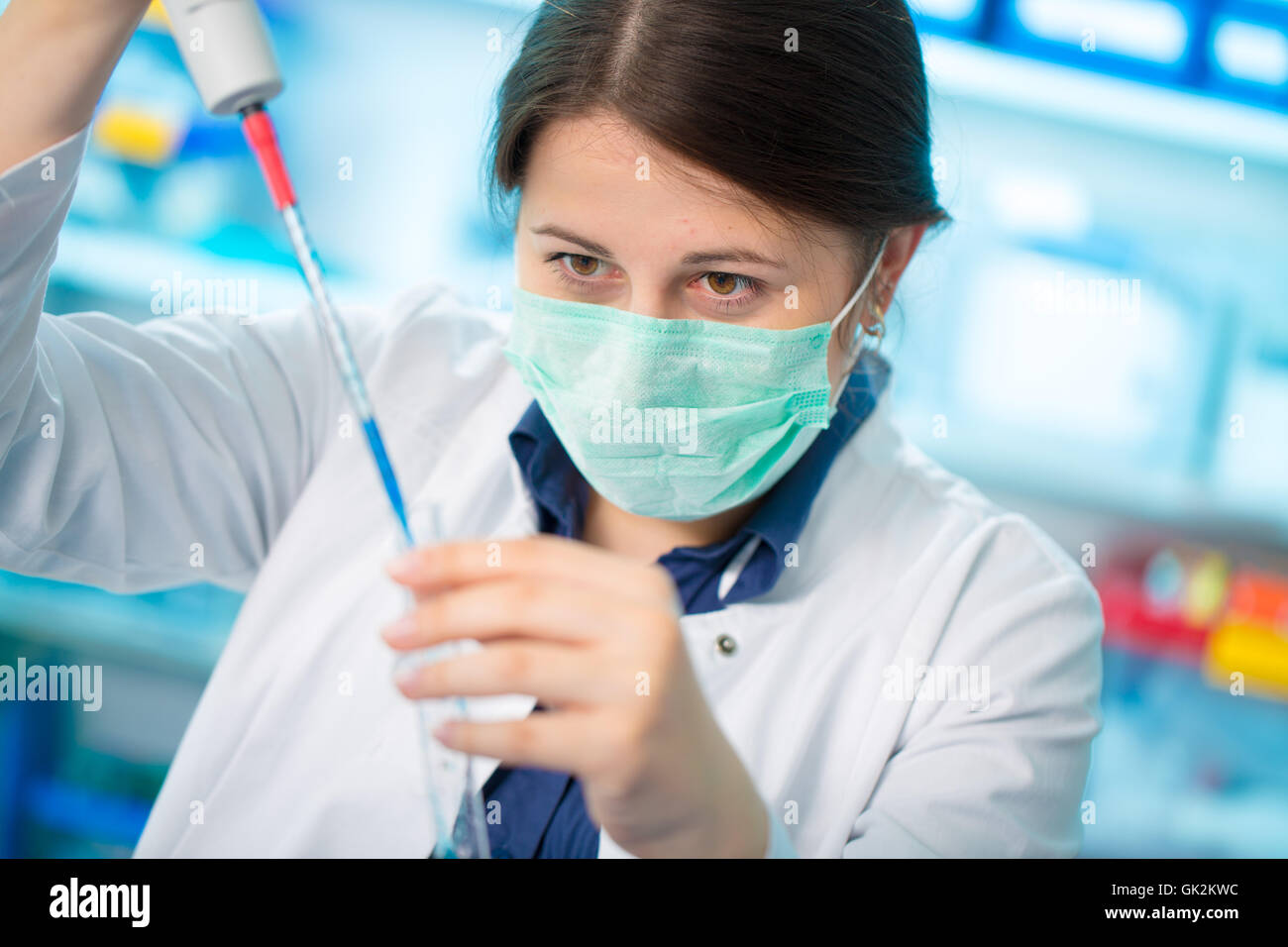 Student girl in chemical classroom with pipette and test tubes Stock ...