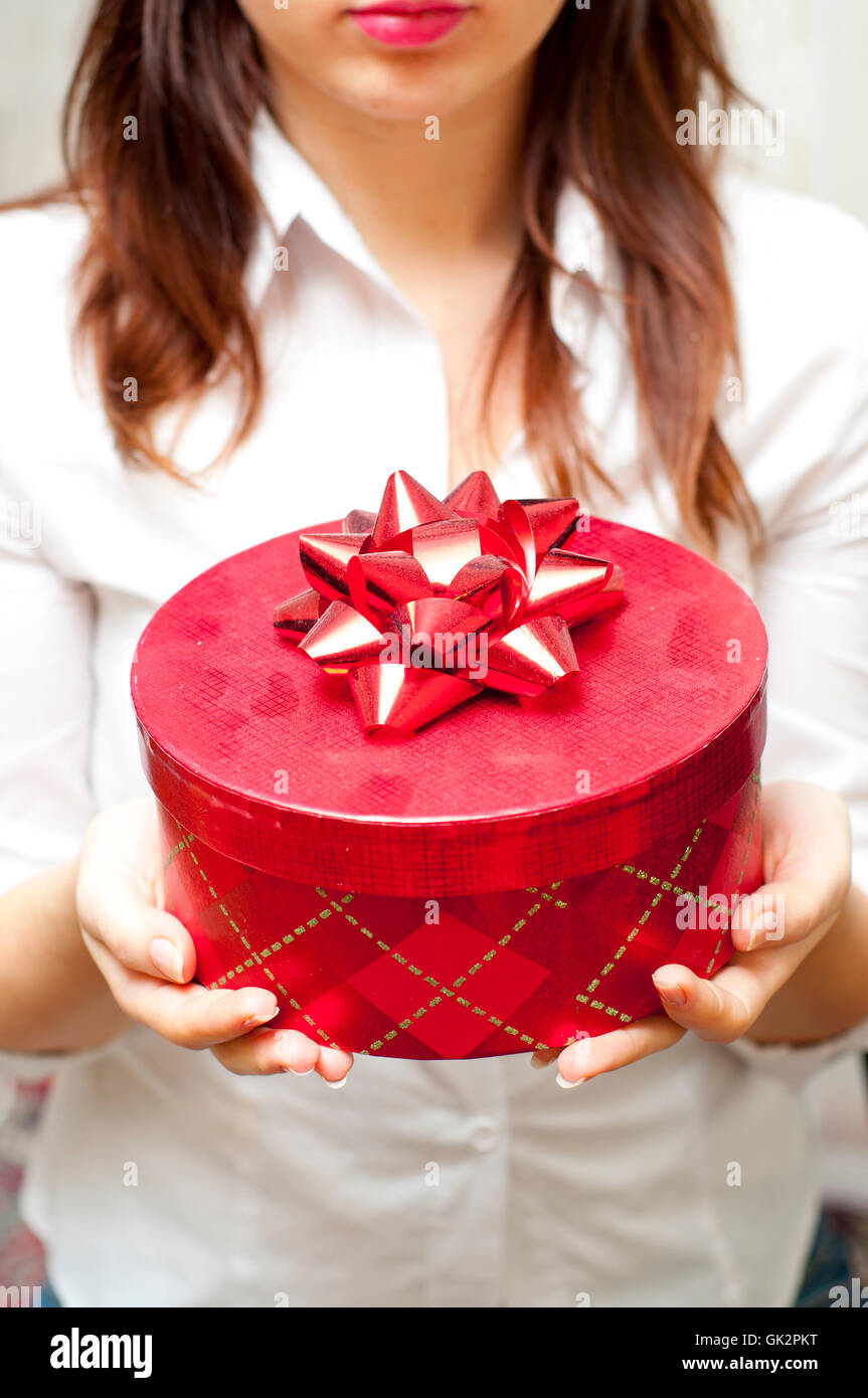 red box holding in hand of young girl Stock Photo - Alamy