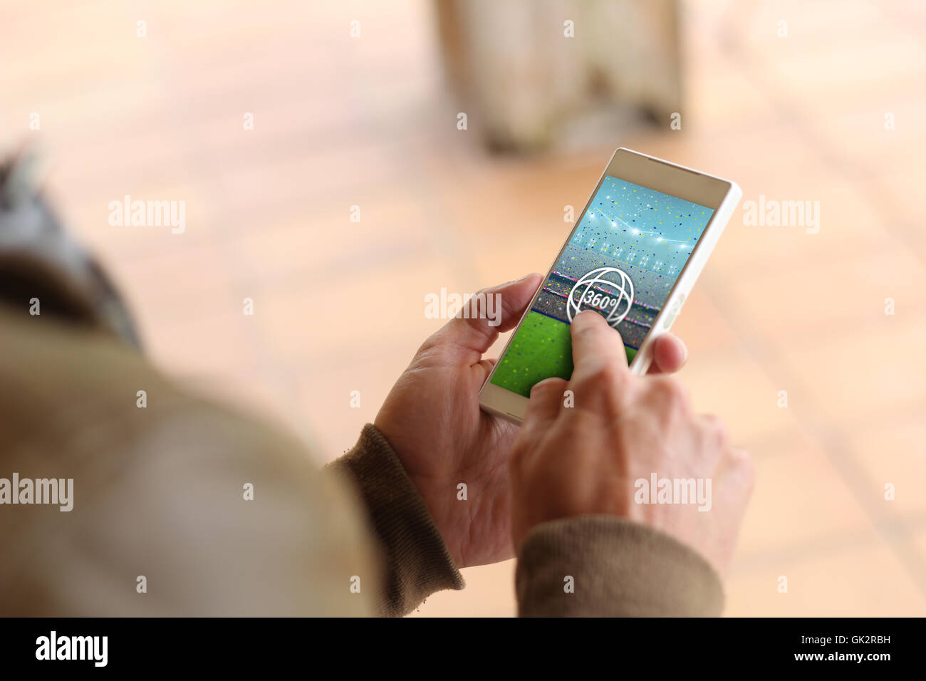 lifestyle concept: Hands male with 360 degree view stadium on ...