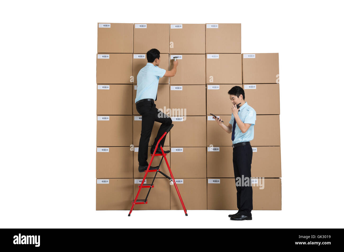 Logistics warehouse staff scan cargo Stock Photo - Alamy