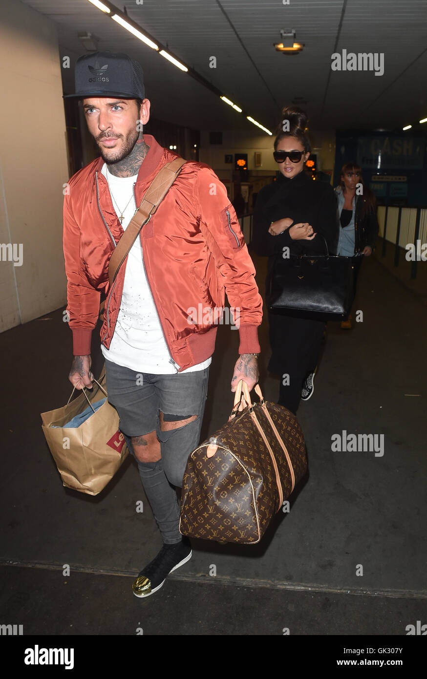 Megan Mckenna and Peter Wicks seen arriving at Euston Station in London ...