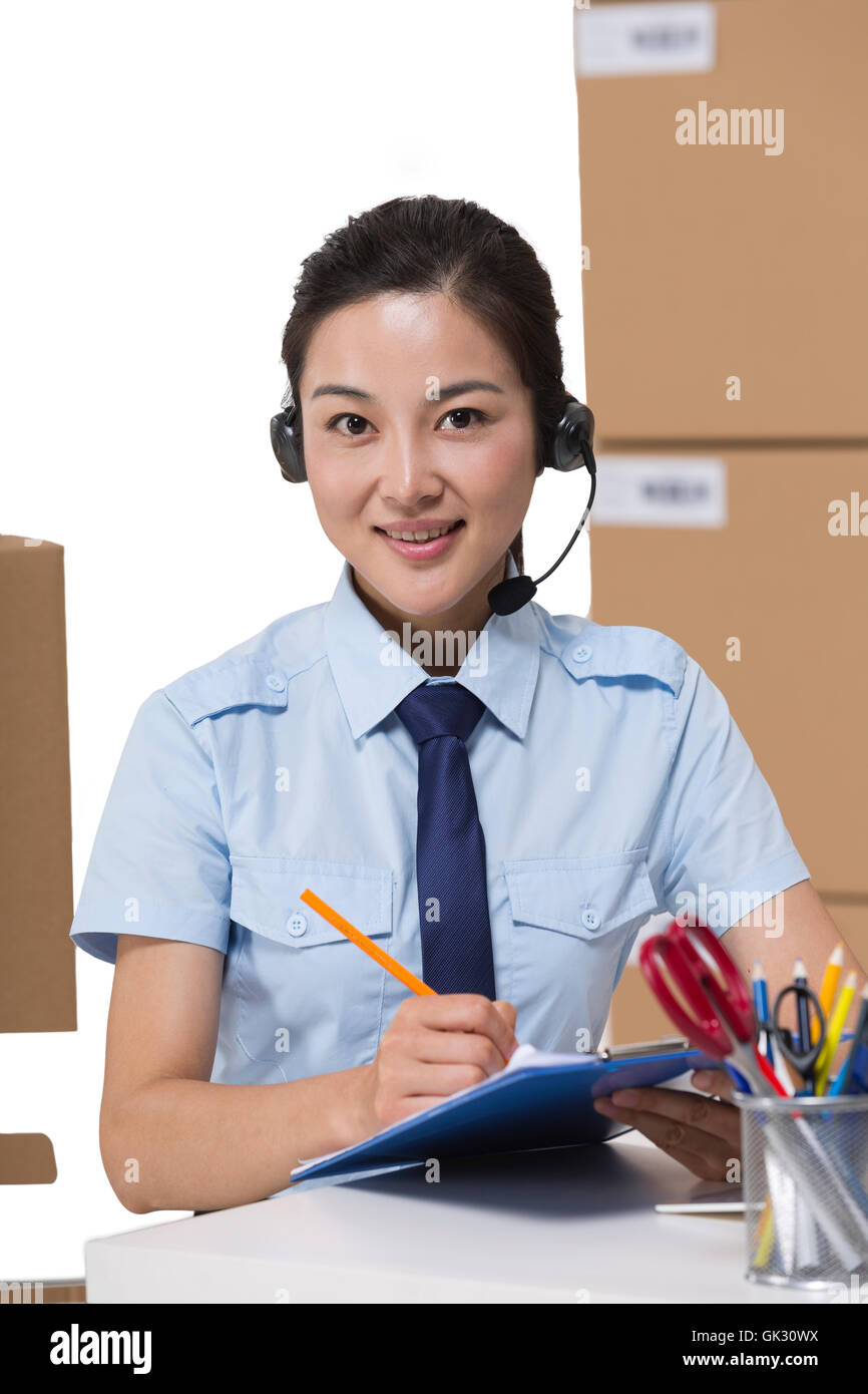 Logistics warehouse customer service staff Stock Photo - Alamy