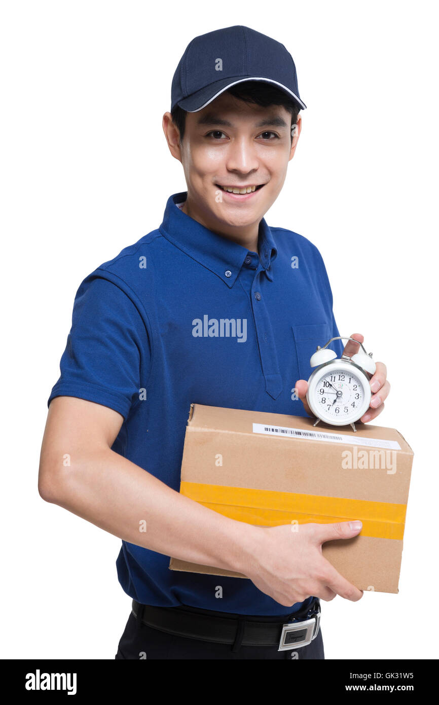 Logistics courier holding a parcel and alarm clock Stock Photo - Alamy