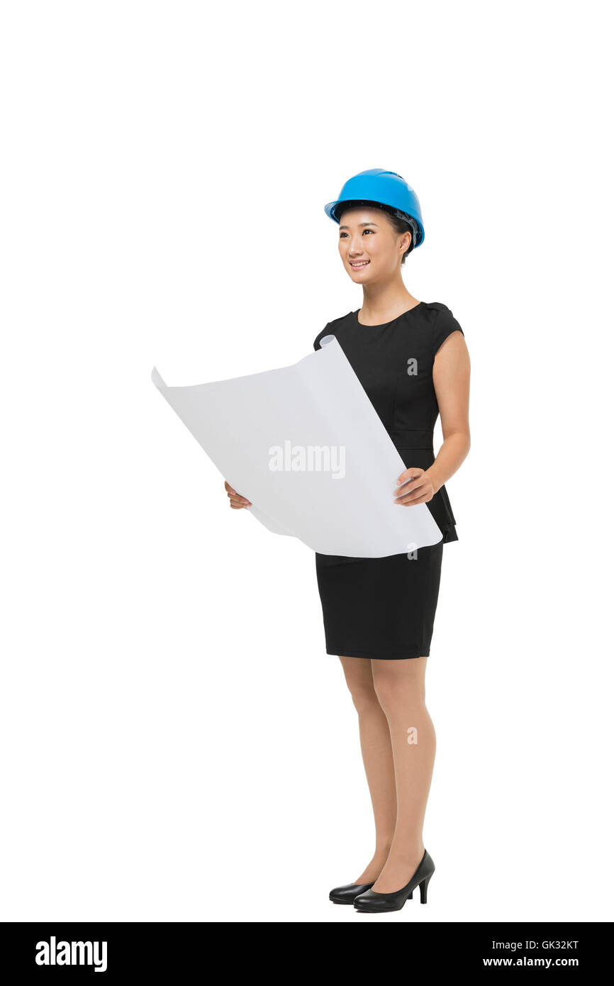 Female architect holding a blueprint Stock Photo - Alamy