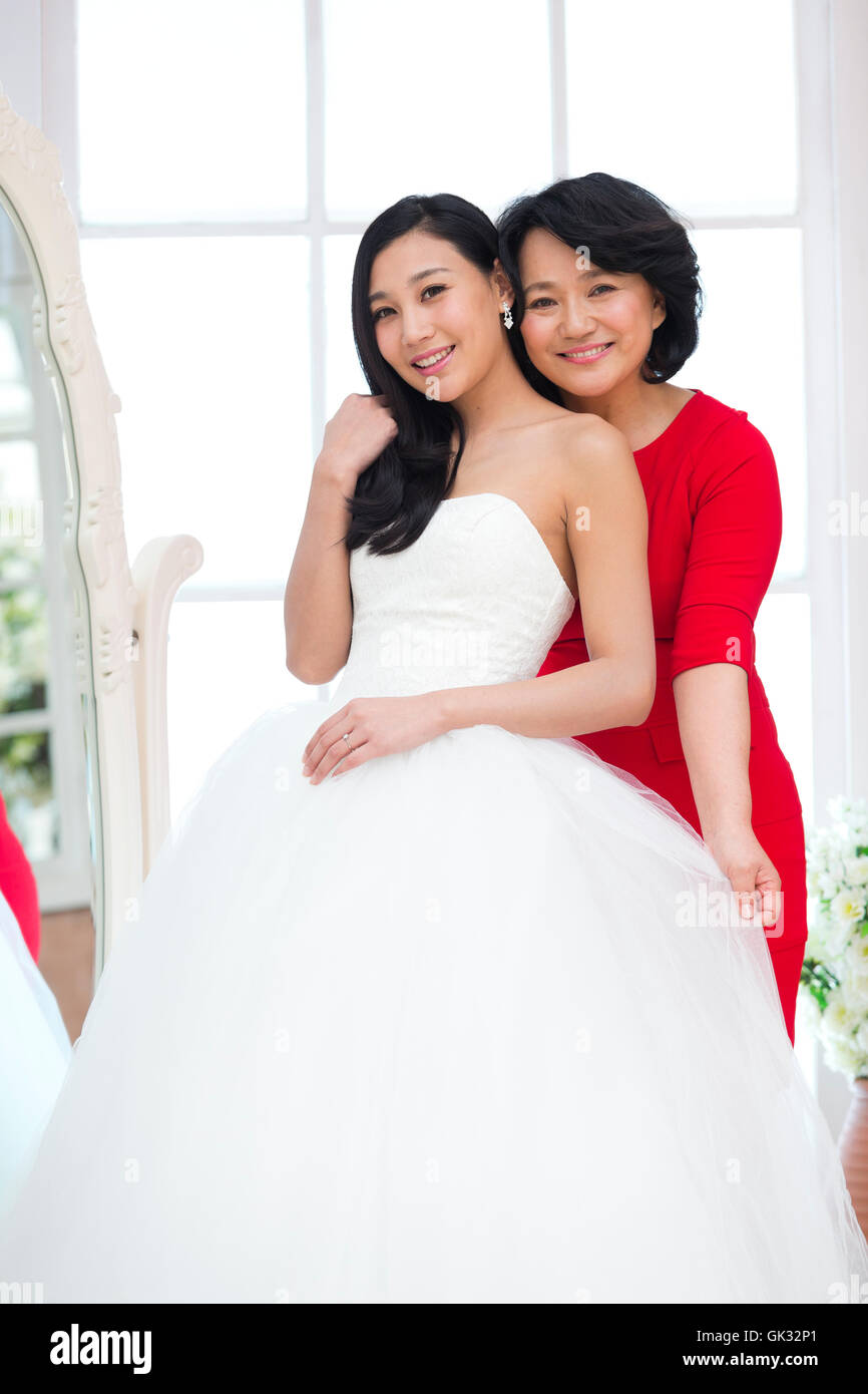 Beautiful bride and mother Stock Photo - Alamy