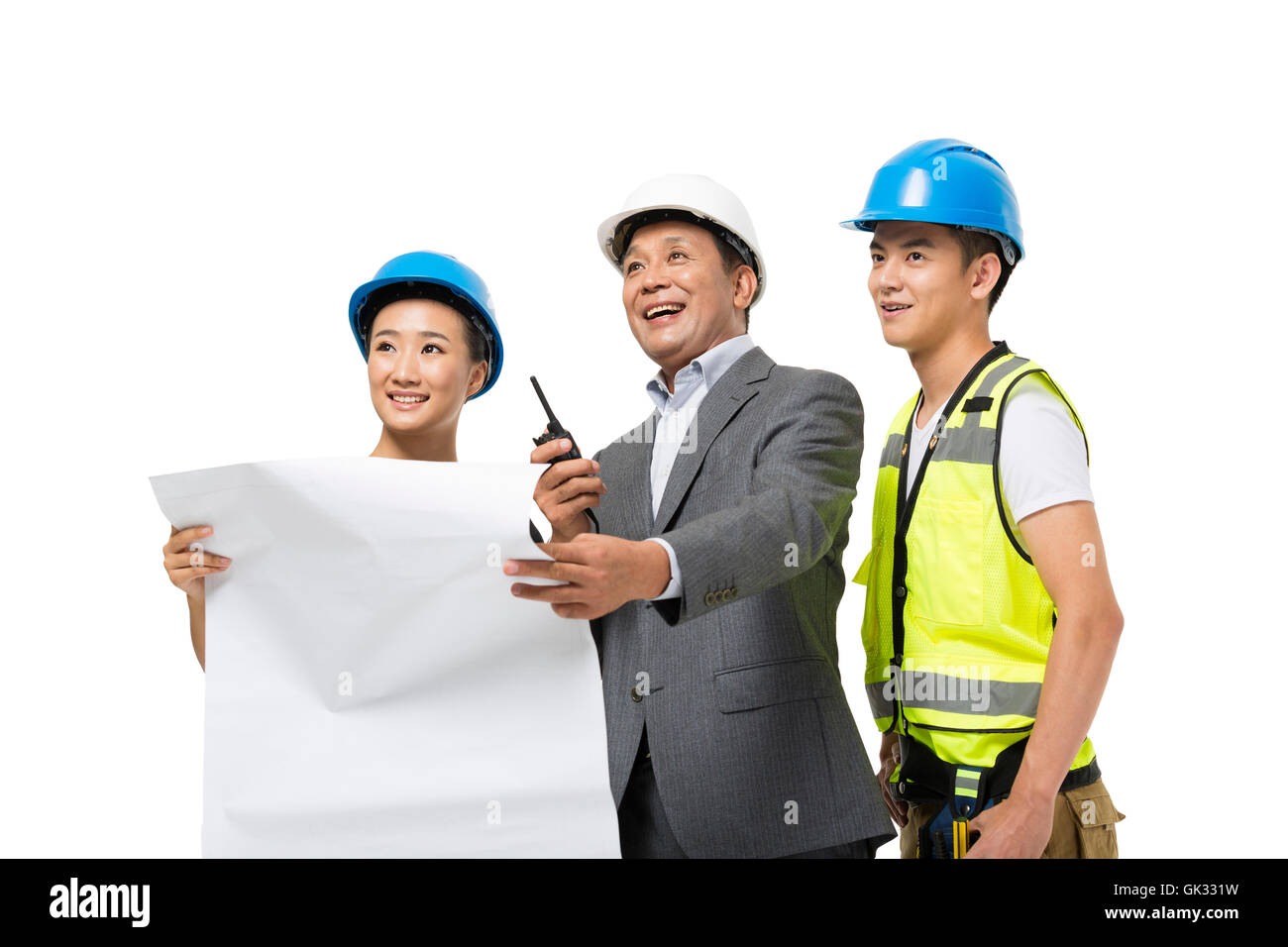 Architectural team holding a drawing Stock Photo - Alamy