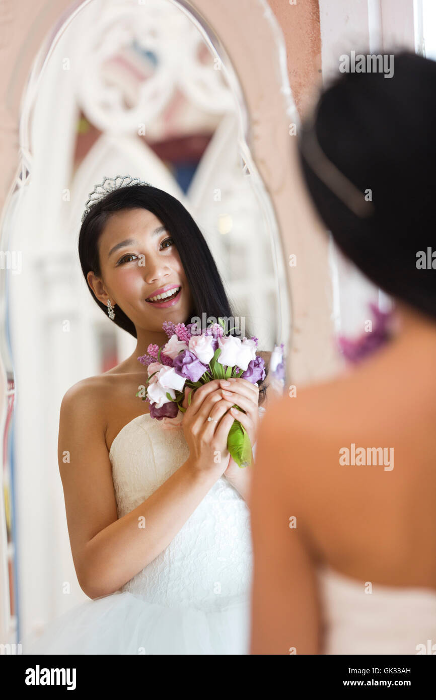 Beautiful bride in the mirror Stock Photo - Alamy