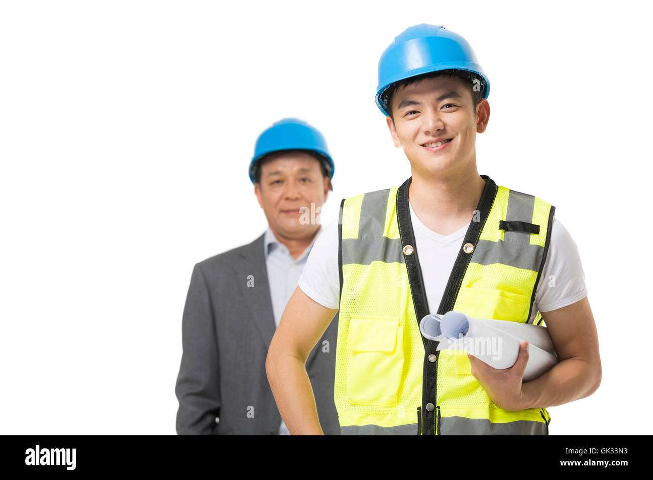 Middle-aged male construction engineers and construction workers Stock ...