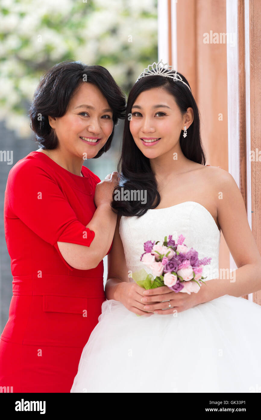 Beautiful bride and mother Stock Photo - Alamy
