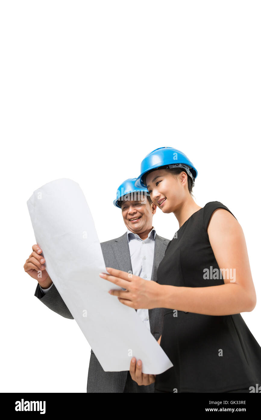 Construction engineer holding a drawing Stock Photo - Alamy