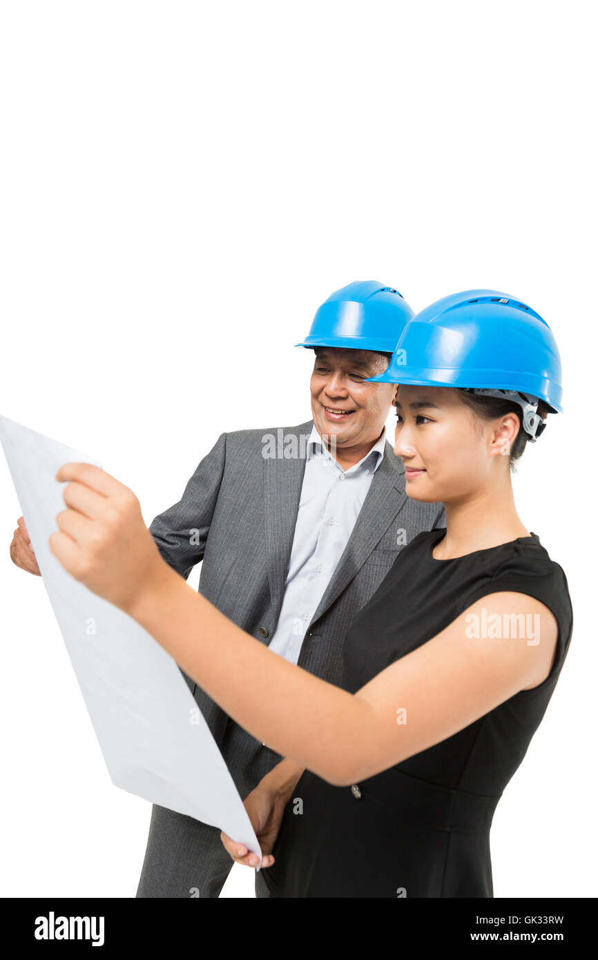 Construction engineer holding a drawing Stock Photo - Alamy