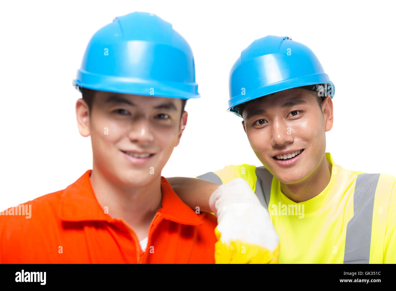 Two young male construction worker Stock Photo - Alamy
