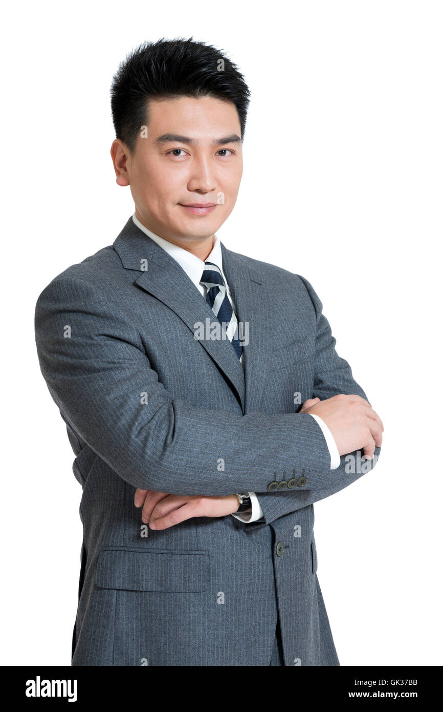 Studio shot business man standing Stock Photo - Alamy