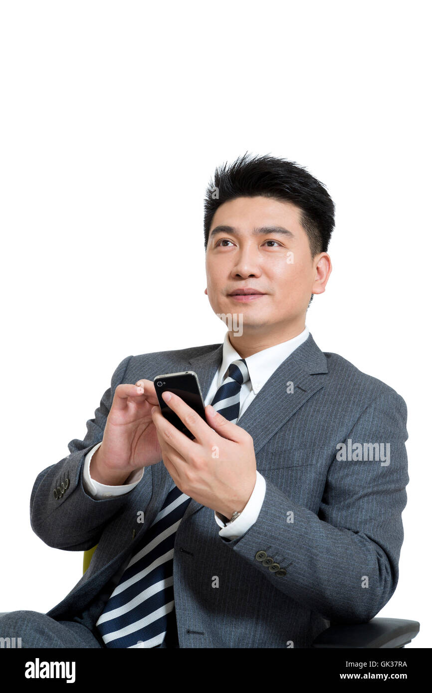 Studio shot business man sitting in office chair Call Stock Photo - Alamy