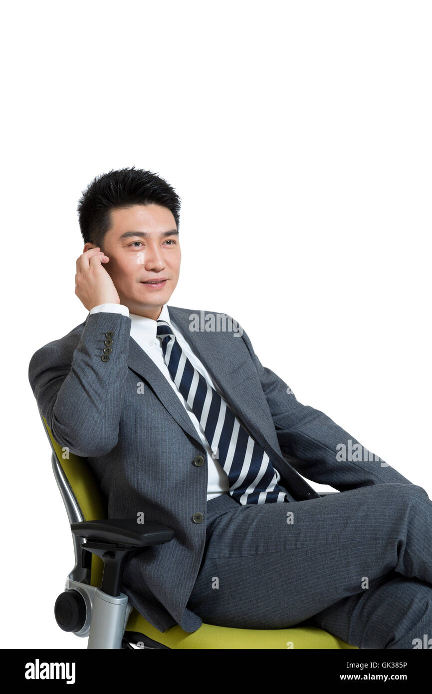 Studio shot business men sitting on office chairs Call Stock Photo - Alamy