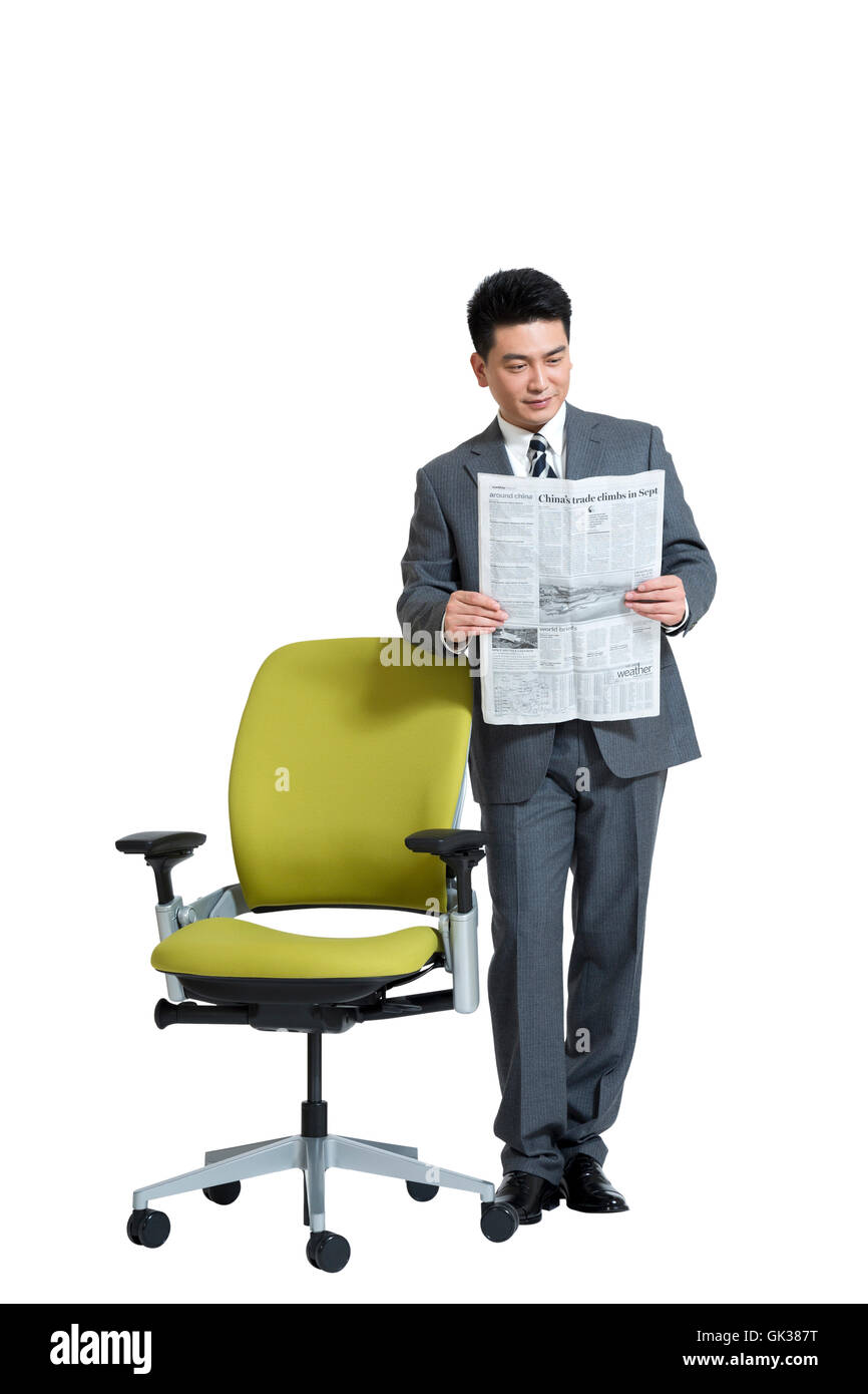 Business man standing next chair hi-res stock photography and images ...