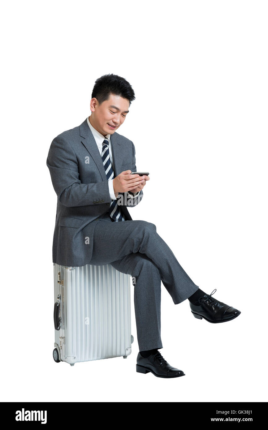 Studio shot business man calling Stock Photo - Alamy