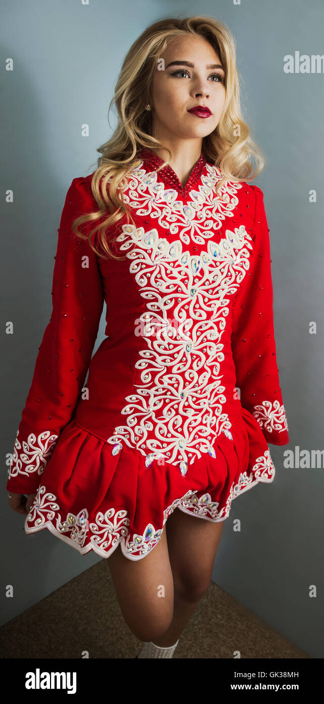 Irish dancer in red competition costume Stock Photo - Alamy