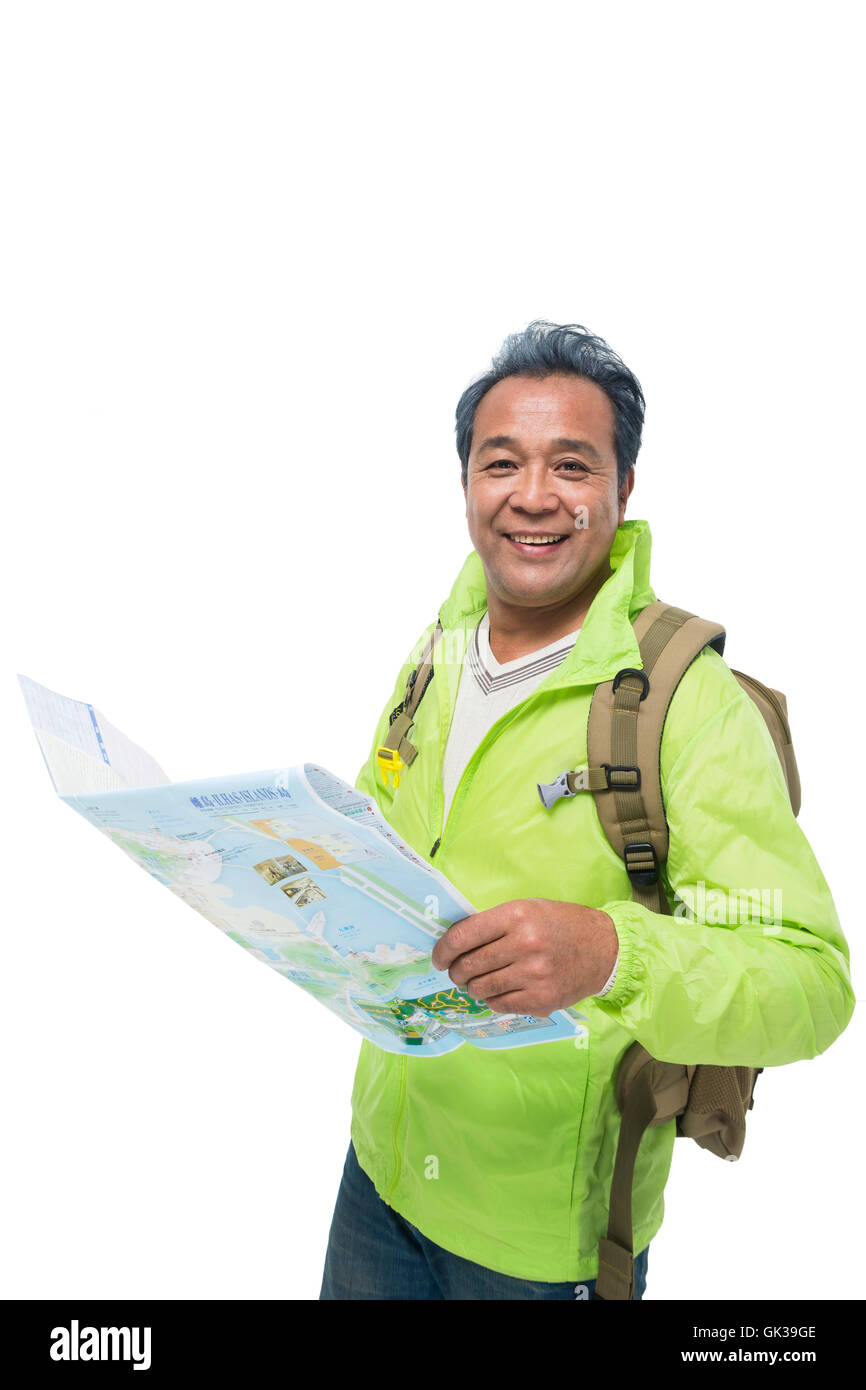 Happy elderly with a map Stock Photo - Alamy