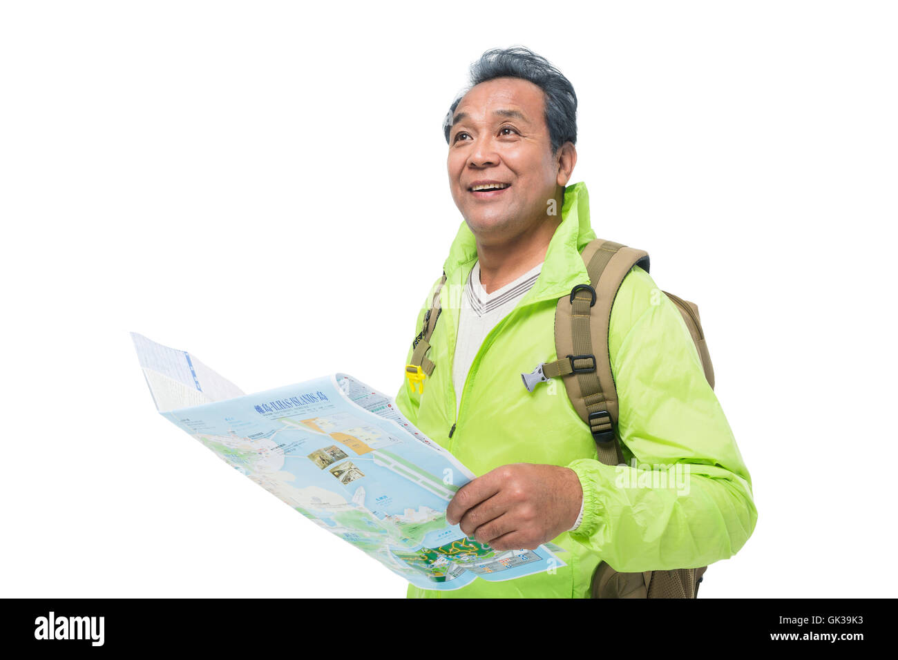 Happy elderly with a map Stock Photo - Alamy