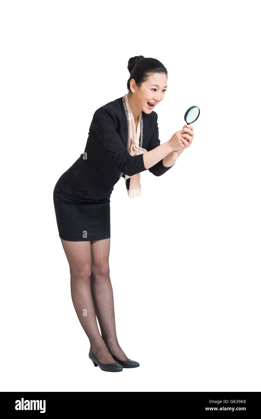 Magnifying glass beauty woman Cut Out Stock Images & Pictures - Alamy