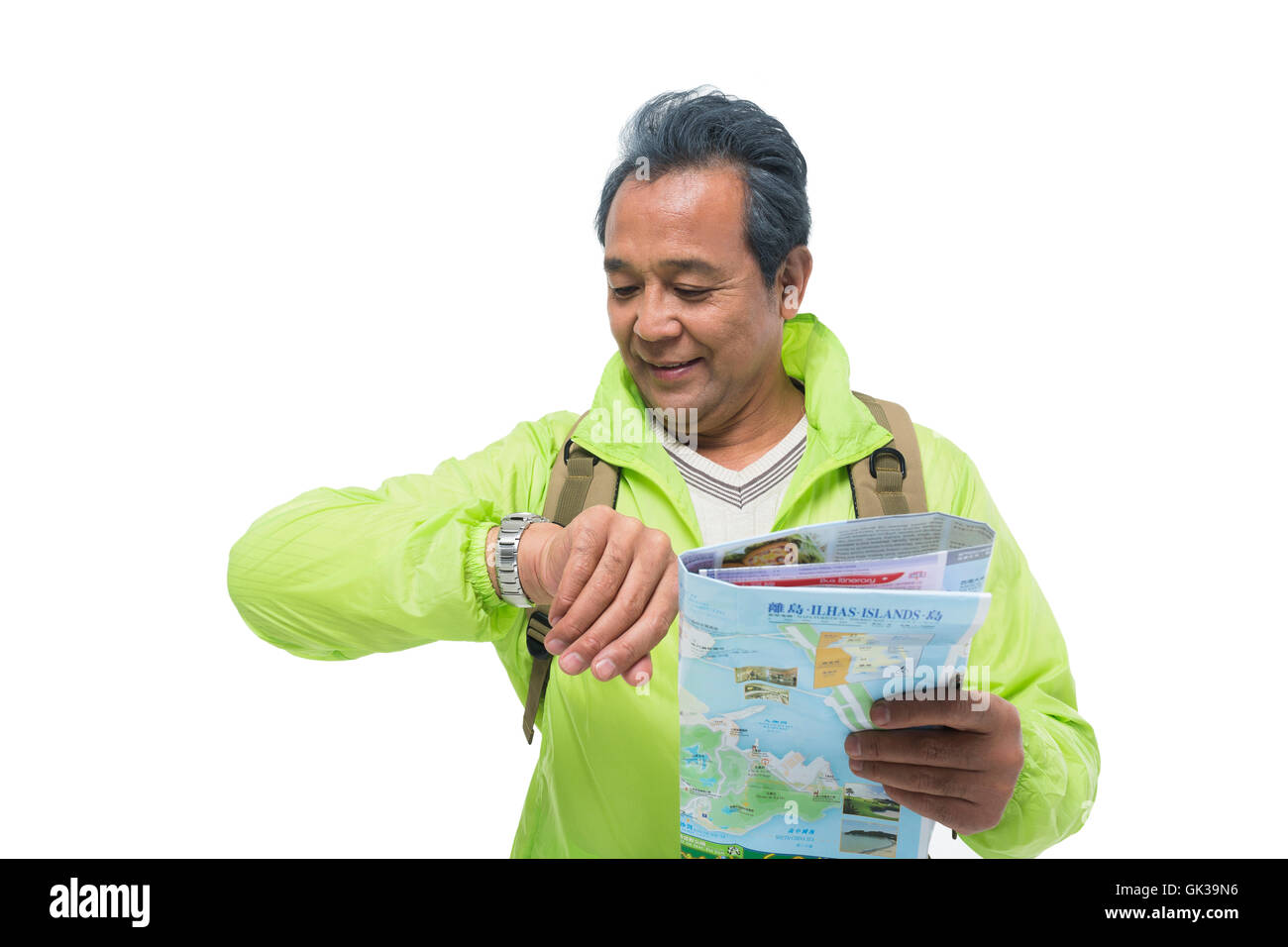 Happy elderly with a map Stock Photo - Alamy